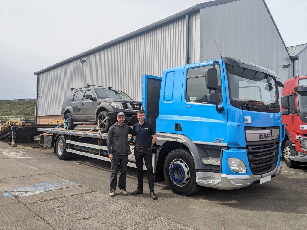 Car loaded on the flatbed using our loading ramp - Walker Movements